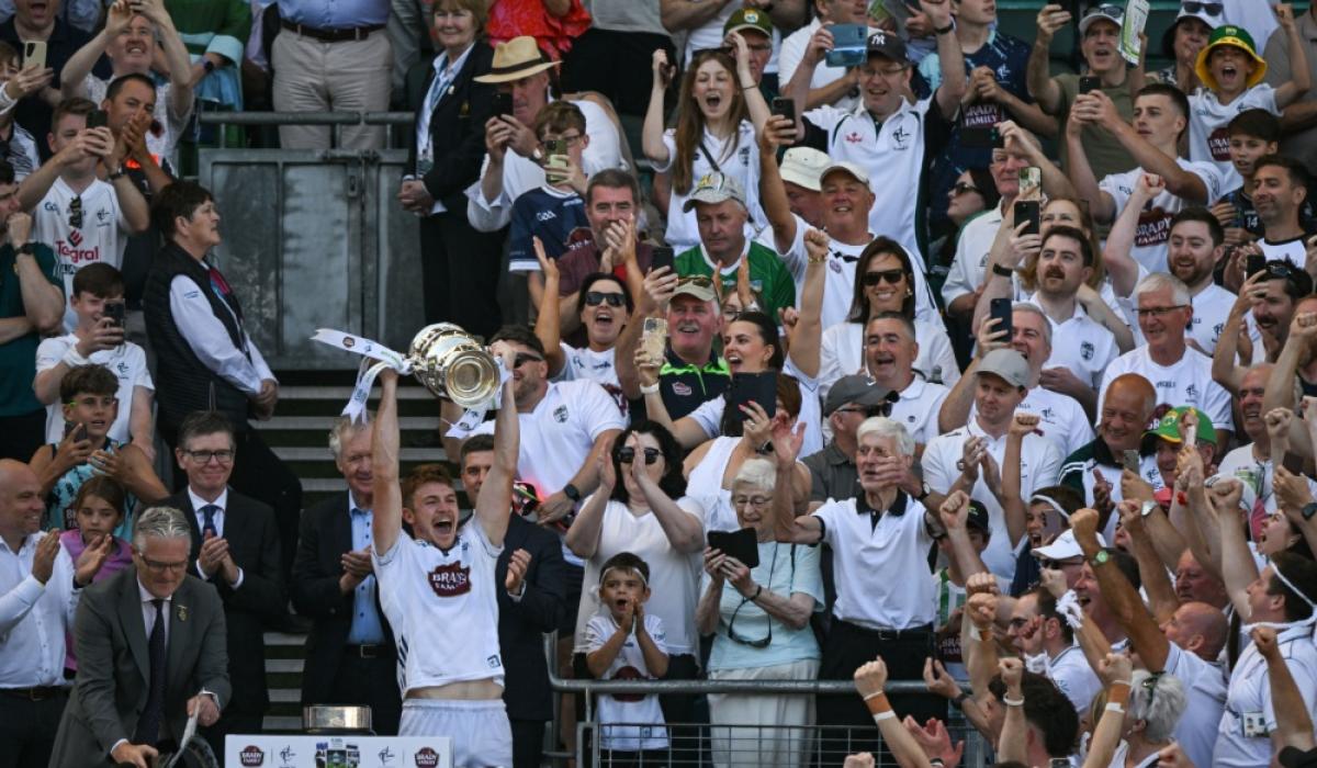 Hill 16 drenched in white and Kevin Feely in the Hogan Stand cap ...