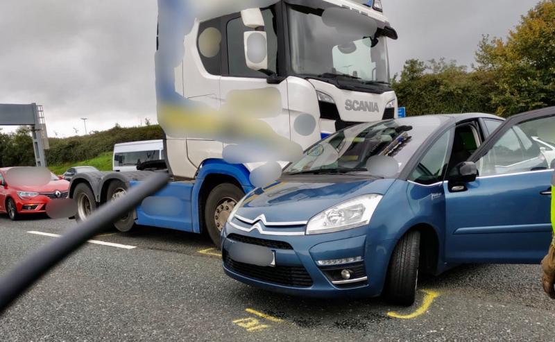 Downpours and strong winds created difficult driving conditions ...